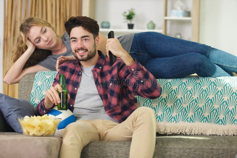 Boyfriend Watching Television Ignoring Partner Stock Image - Image of ...