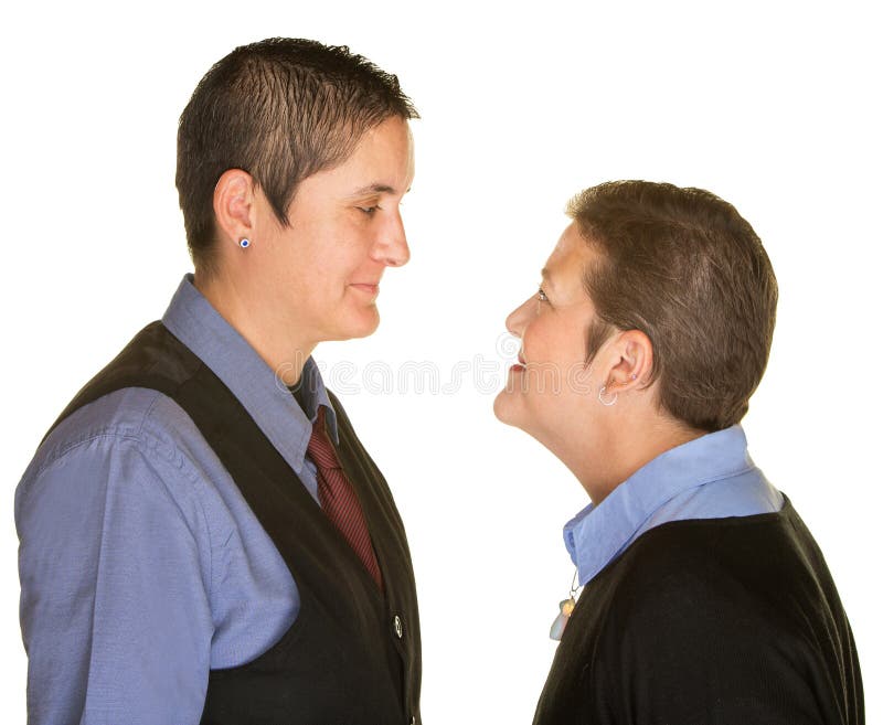 Boyish Couple Staring at Each Other Stock Image - Image of facing ...