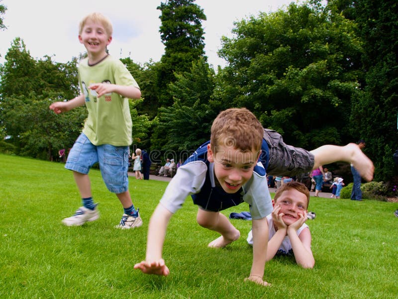 Two friends playing stock photo. Image of football, playing - 239878