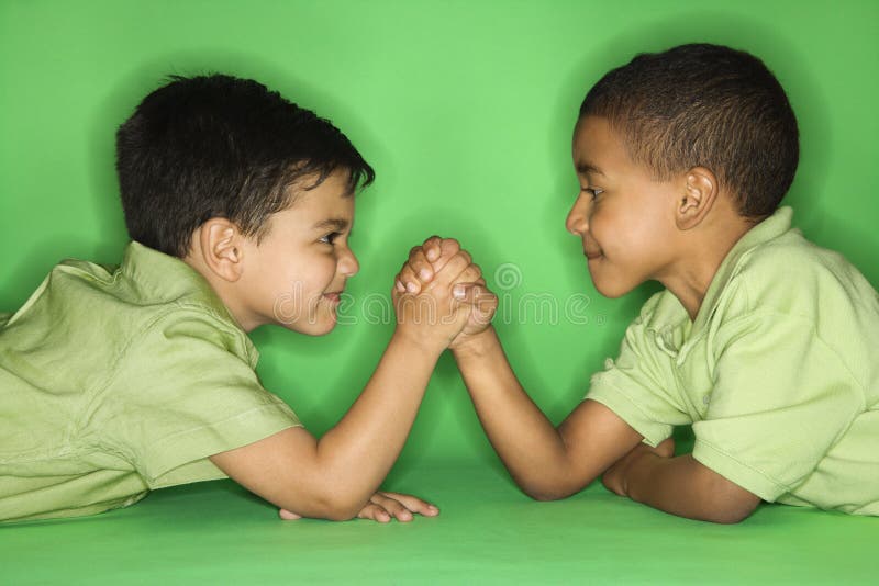 Boys arm wrestling. stock photo. Image of african, human - 2044866