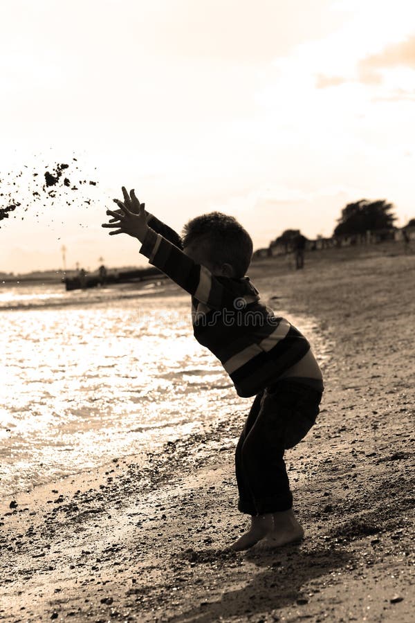 Boys on beach stock image. Image of pair, cool, rocks - 23763687