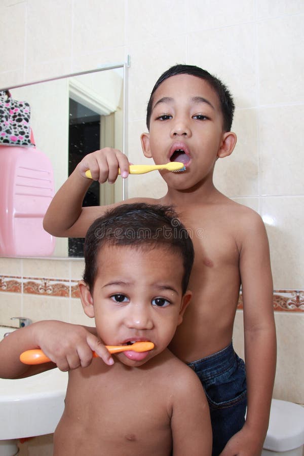 Boys brushing teeth stock image. Image of cheerful, medical - 22466165
