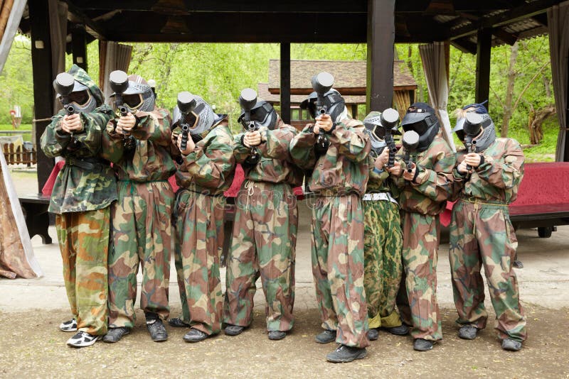 Boys in Camouflage Stand with Paintball Guns Stock Photo - Image of ...