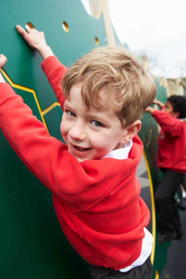 Children on Climbing Wall in School Playground at Breaktime Stock Image ...