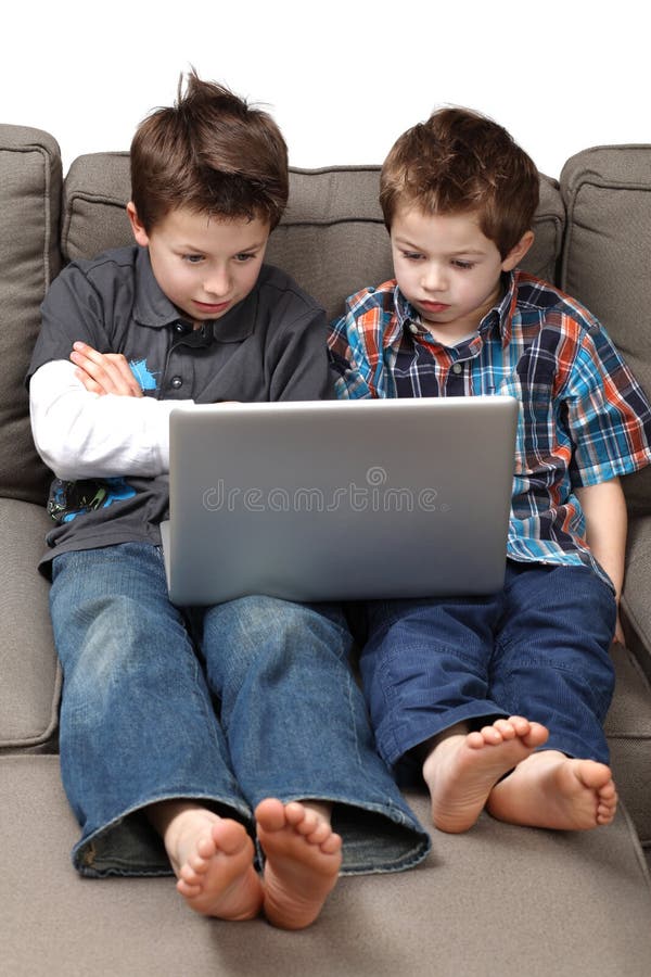 Boys with computer stock photo. Image of looking, sweet - 18483954
