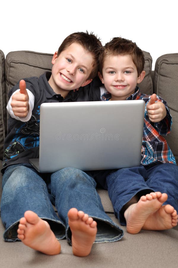 Boys with computer stock photo. Image of indoor, male - 18484098