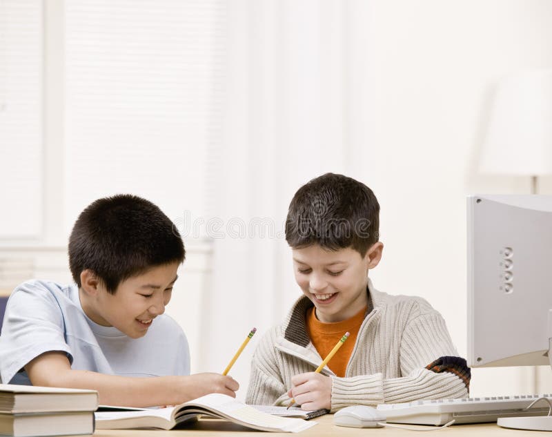 Boys Doing Homework Together Stock Photo - Image of head, friend: 5399694
