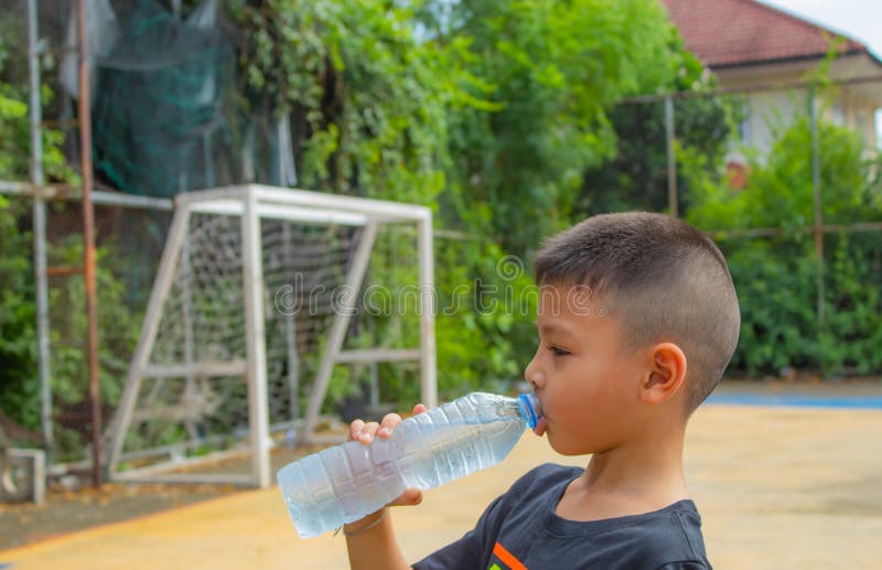 The Boys are Drinking Cold Water. Stock Image - Image of childhood ...