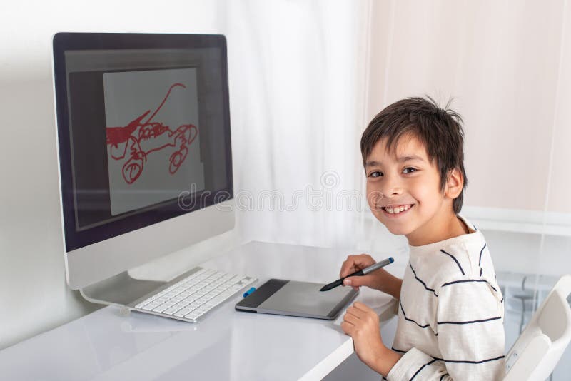 Boys Enthusiastically Draw on a Computer Using a Tablet Stock Photo ...