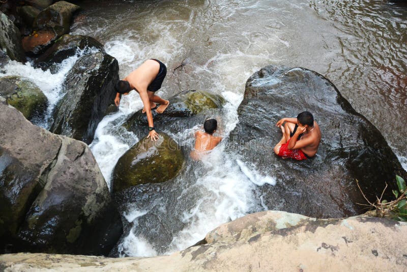 Boys Funny Waterfall editorial photo. Image of family - 44269091