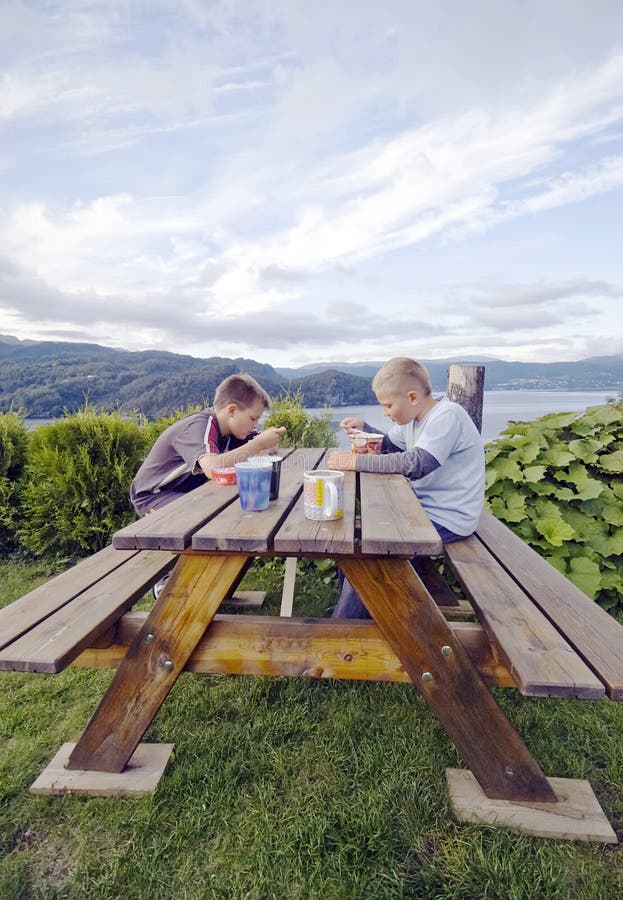 Boys having picnic meal stock image. Image of breakfast - 3487027
