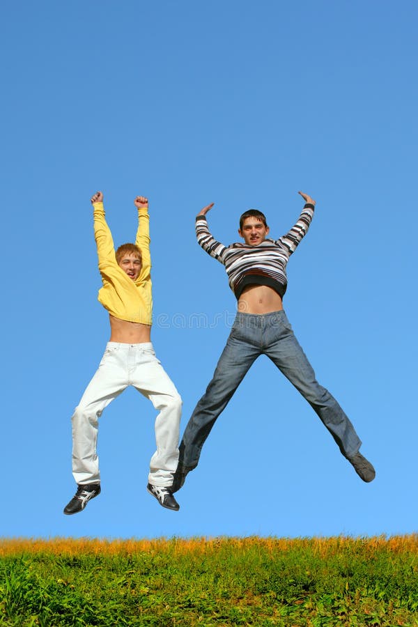 Happy boys jumping stock photo. Image of length, inspiration - 3103718