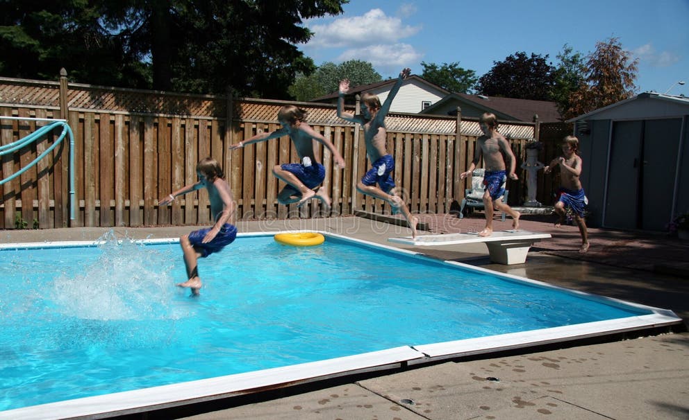 Boys Jumping into Pool stock image. Image of boys, summer - 2350925