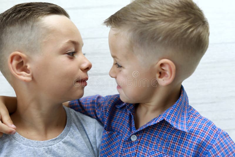 Two Boys Look at Each Other Stock Image - Image of ride, beautiful ...