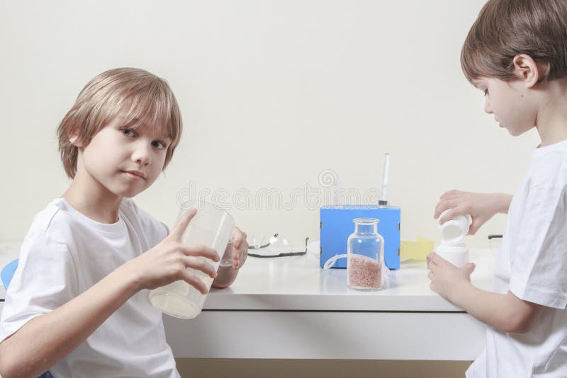 Boys Making Science Experiments. Education Concept. Stock Photo - Image ...