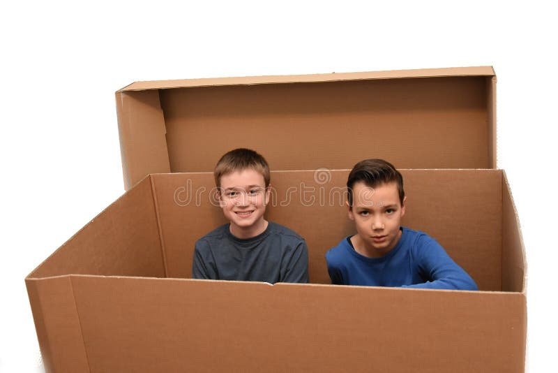 Boys in moving box stock image. Image of laugh, happy - 65646449