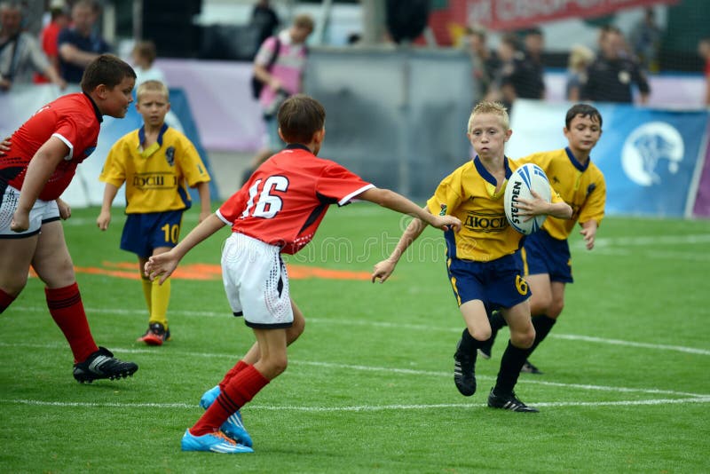 The boys play Rugby editorial stock image. Image of dynamic - 82558164