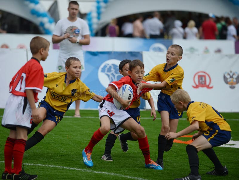 The boys play Rugby editorial image. Image of running - 82568075