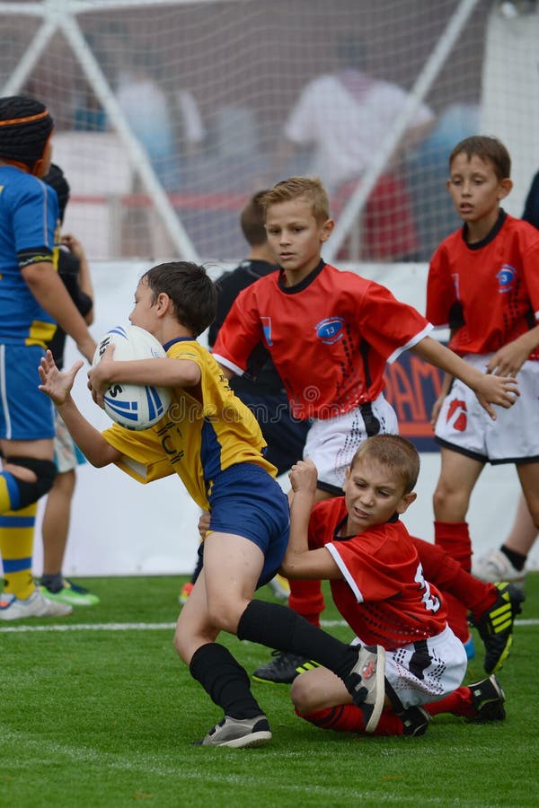 The boys play Rugby editorial image. Image of stadium - 82610960