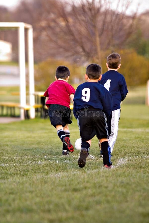 Boys playing soccer stock image. Image of teamwork, soccer - 2361625