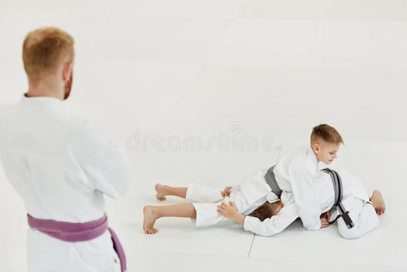 Boys Practicing the Techniques Stock Photo - Image of standing, teacher ...