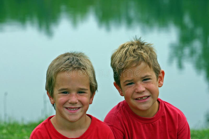 Boys in Red stock image. Image of outdoor, families, cute - 1243245