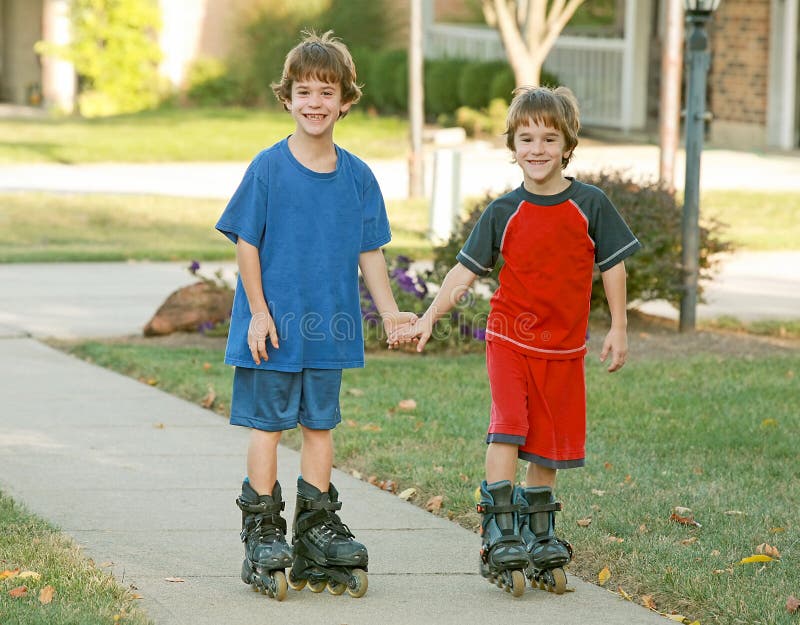 Kids Roller-Blading stock image. Image of childhood, grin - 2331065