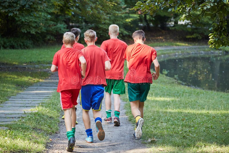 Boys running in park editorial image. Image of lifestyle - 65026930