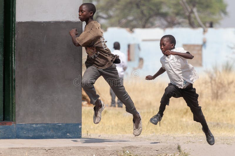 Boys Running To School for Lessons in Namibia. Editorial Photo - Image ...