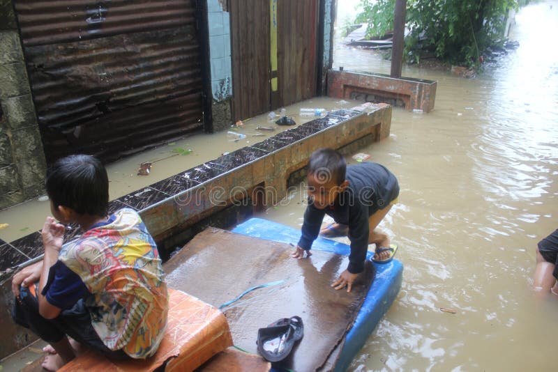 Boys Sitting on a Boat in the Flood Editorial Image - Image of floods ...