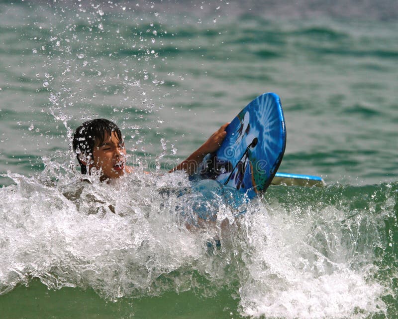 Child is Putting on a Lifevest Stock Image - Image of beach, summer ...