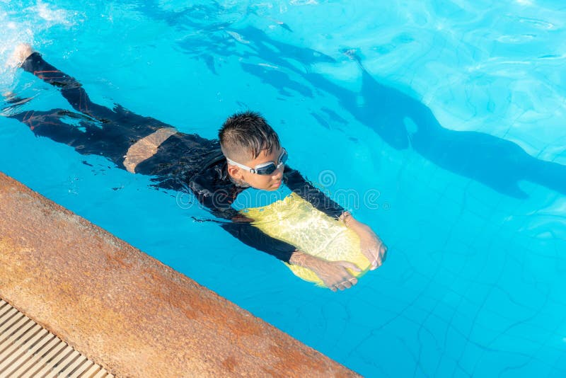 Boy playing water stock photo. Image of aquatic, playing - 142321654