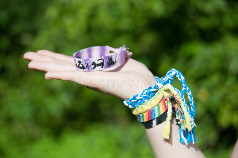 Bracelets from threads stock photo. Image of knot, palm - 58174966