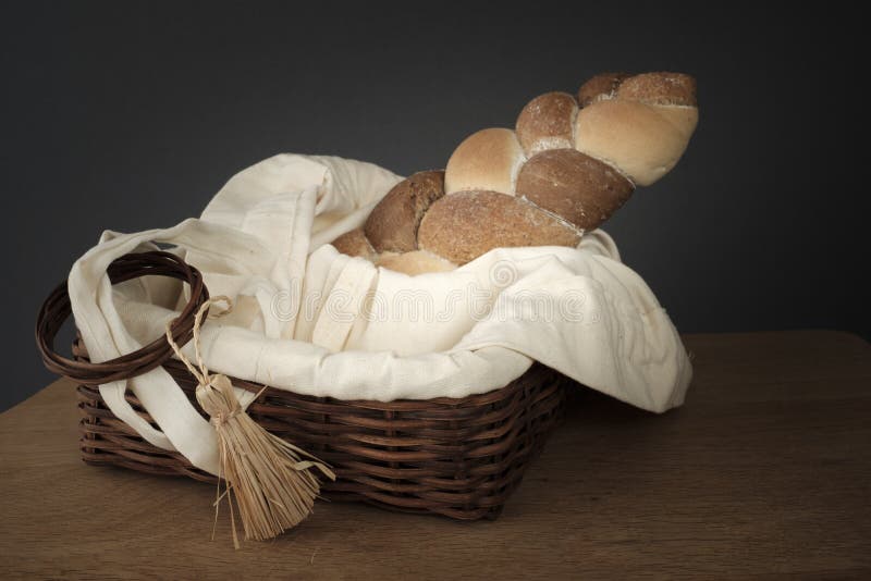 Braided Bread in a Wicker Basket on the Table Stock Photo - Image of ...