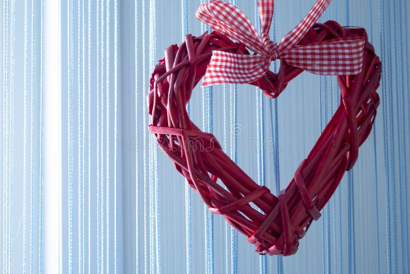 Braided Red Heart on a Blue Background Stock Photo - Image of heart ...