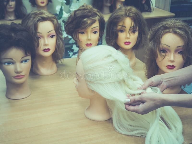 Braiding a Braid on a Mannequin. Training Braiding. Stock Image - Image ...
