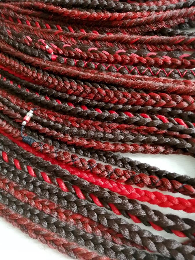 Braids on a Wood Background at Close Range Stock Photo - Image of ...