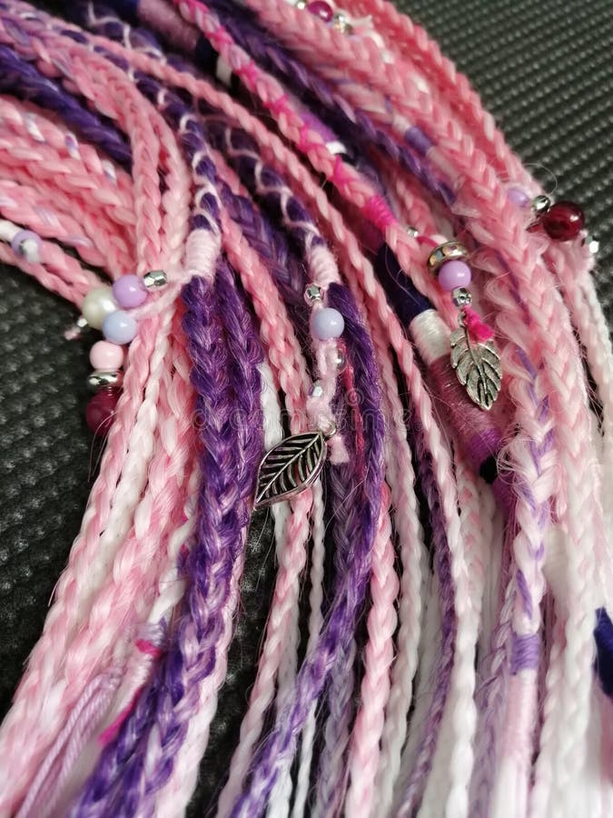 Braids on a Wood Background at Close Range Stock Photo - Image of ...