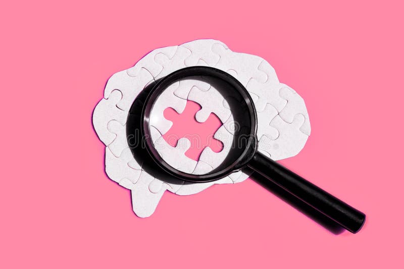 Brain Puzzle and Magnifying Glass on Pink Backdrop Stock Photo - Image ...