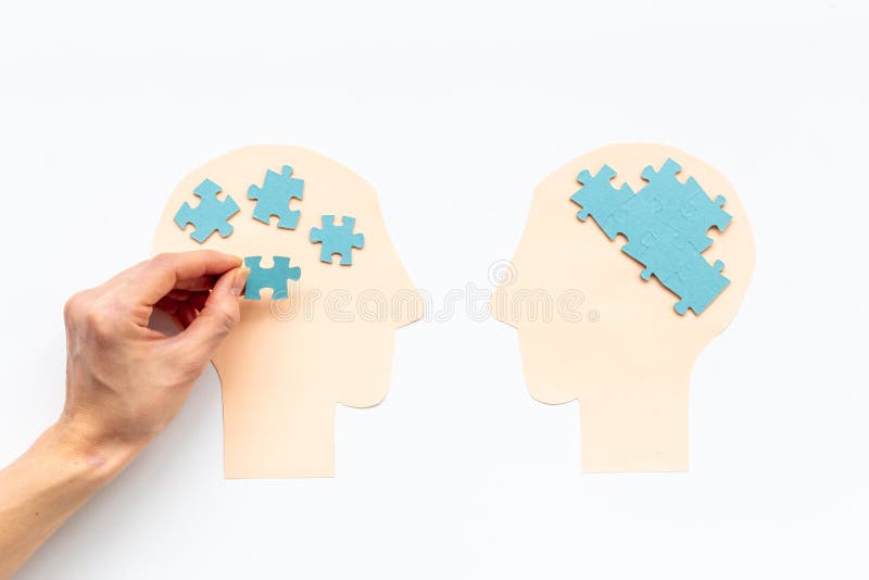 Brain Puzzles on Two Human Heads. Communication and Connection Concept ...