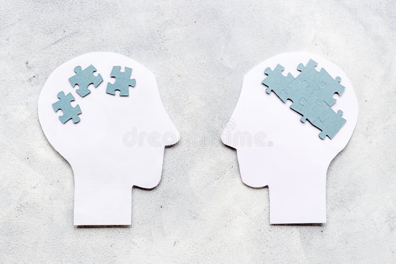 Brain Puzzles on Two Human Heads. Communication and Connection Concept ...