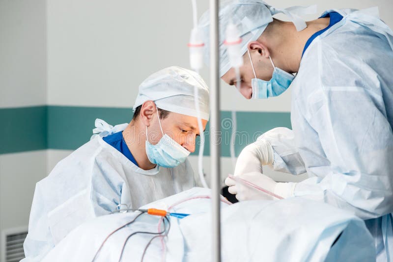 Brain Surgery. Group of Surgeons in Operating Room with Surgery ...