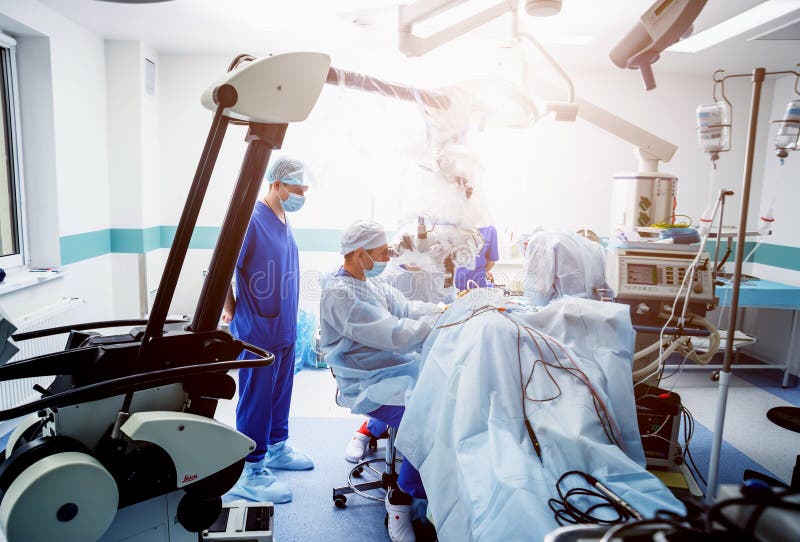 Brain Surgery. Group of Surgeons in Operating Room with Surgery ...