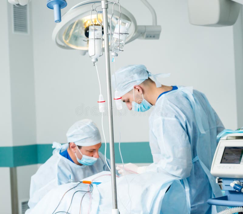 Brain Surgery. Group of Surgeons in Operating Room with Surgery ...