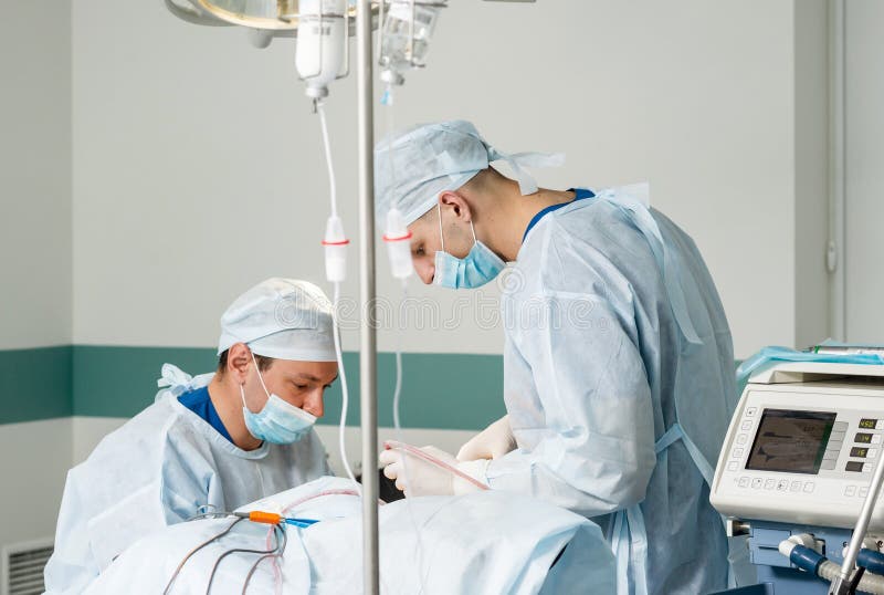 Brain Surgery. Group of Surgeons in Operating Room with Surgery ...