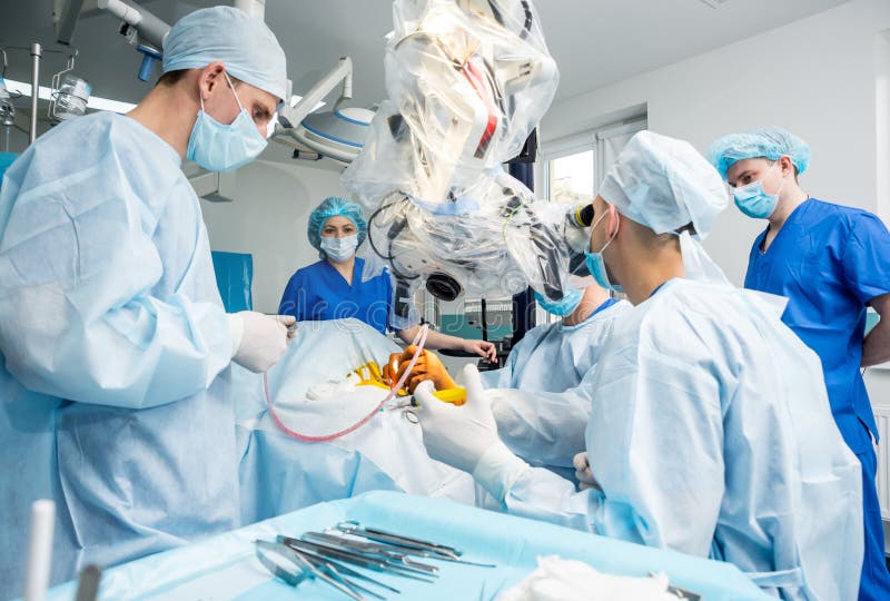 Brain Surgery. Group of Surgeons in Operating Room with Surgery ...