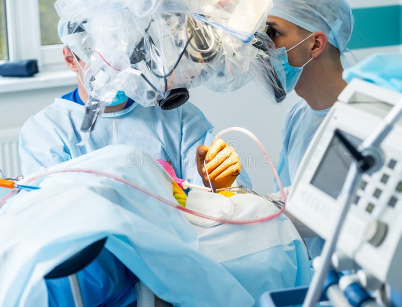 Brain Surgery. Group of Surgeons in Operating Room with Surgery ...