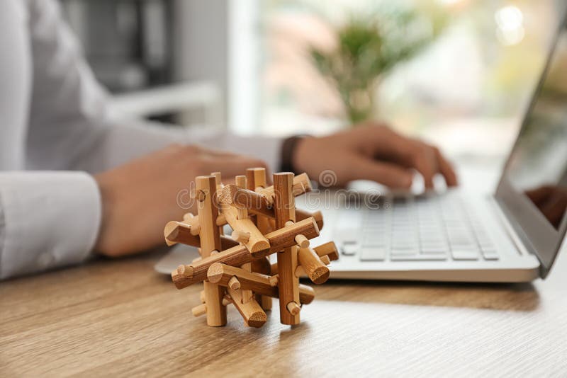 Brain Teaser on Wooden Table of Businessman Stock Image - Image of ...