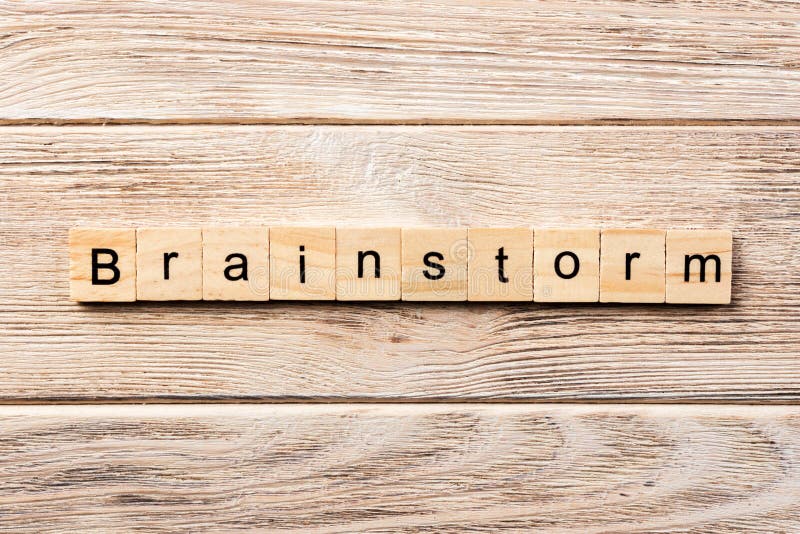 Brainstorm Word Written on Wood Block. Brainstorm Text on Table ...
