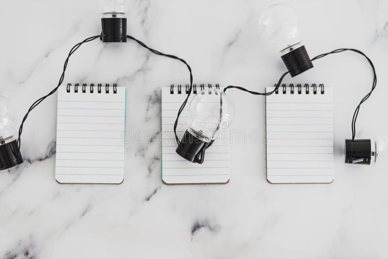 Brainstorming and Finding Innovative Ideas, Group of Notepads with ...